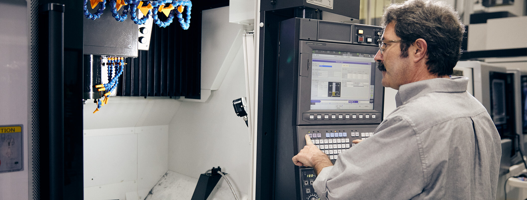 Request a Demo of Okuma's OSP Control